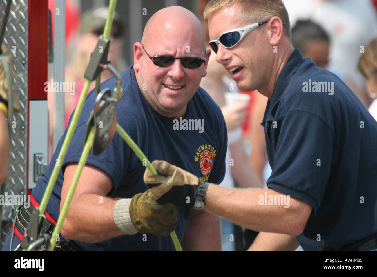 Wauwatosa Fire Department fire fighters holding the support rescue ...