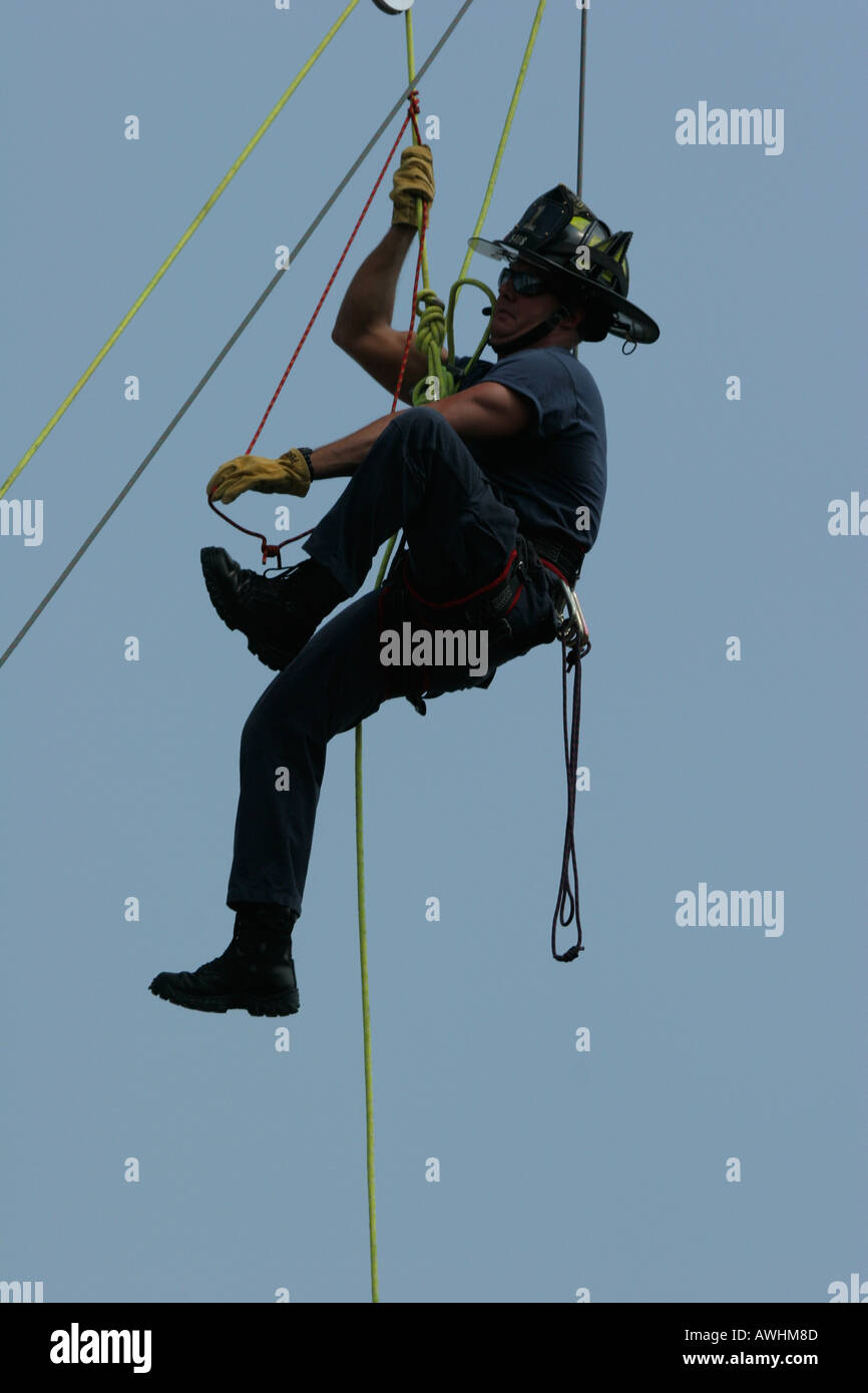 Fireman climbing rope hi-res stock photography and images - Alamy