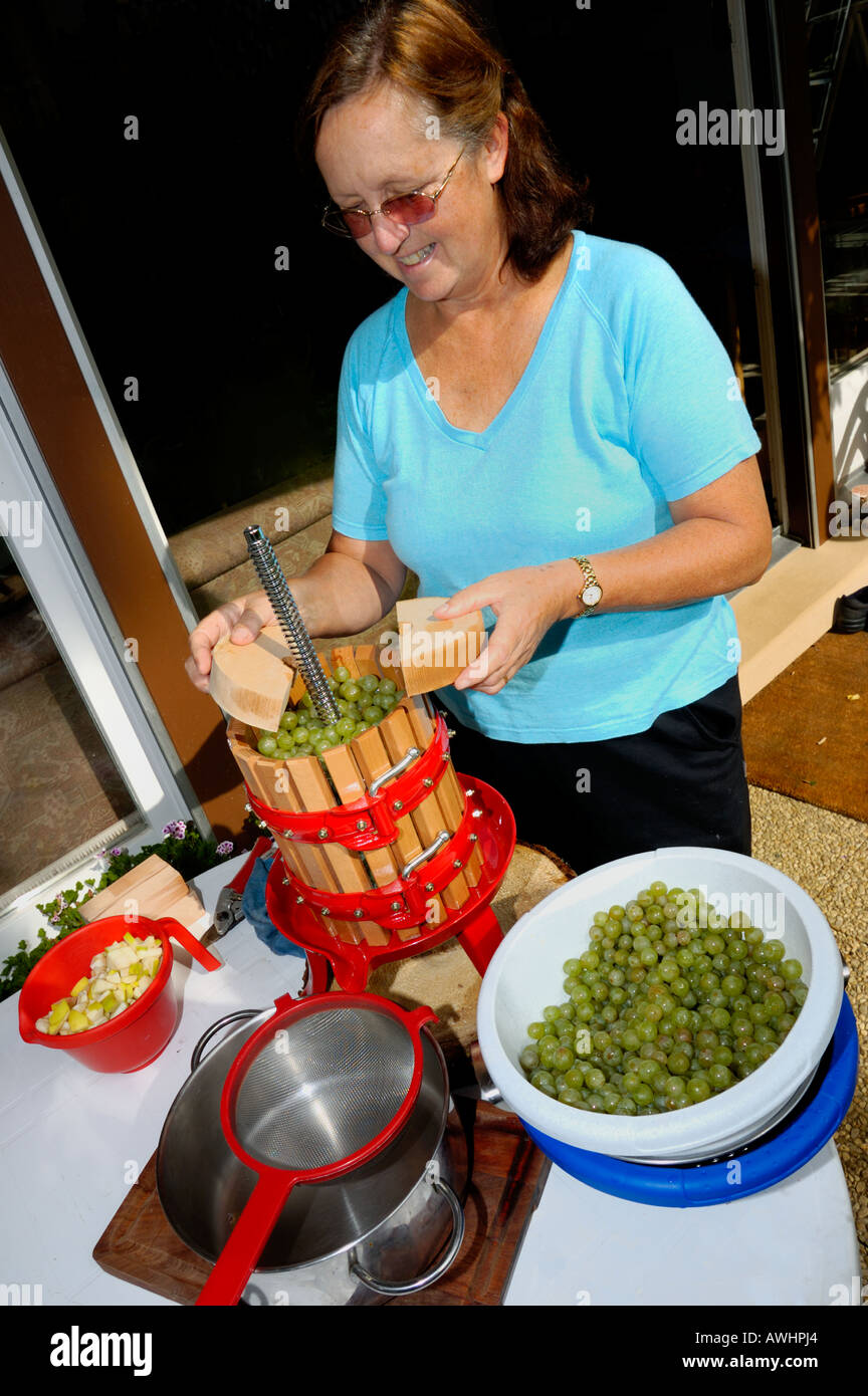 Woman pressing fruit juice hi-res stock photography and images - Alamy