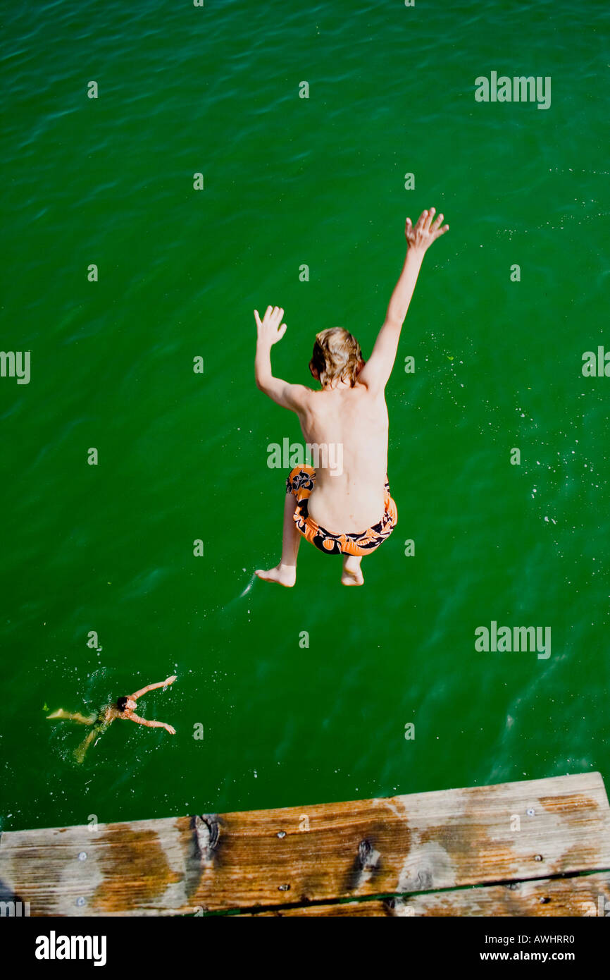 Kid Jumping Diving Board High Resolution Stock Photography and Images ...