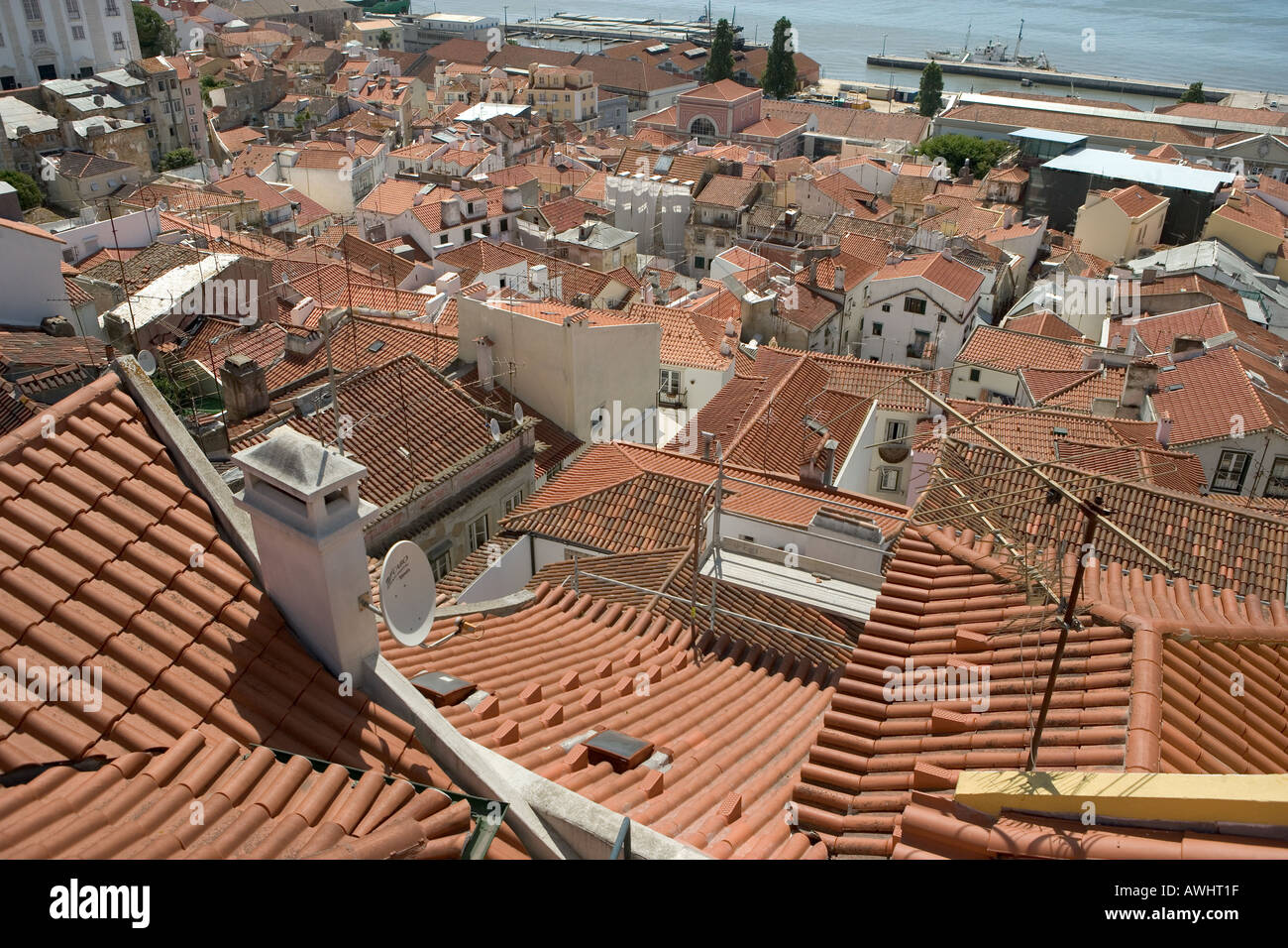 Red tiled rooftops of Lisbon Portugal bristling also with antennas and ...