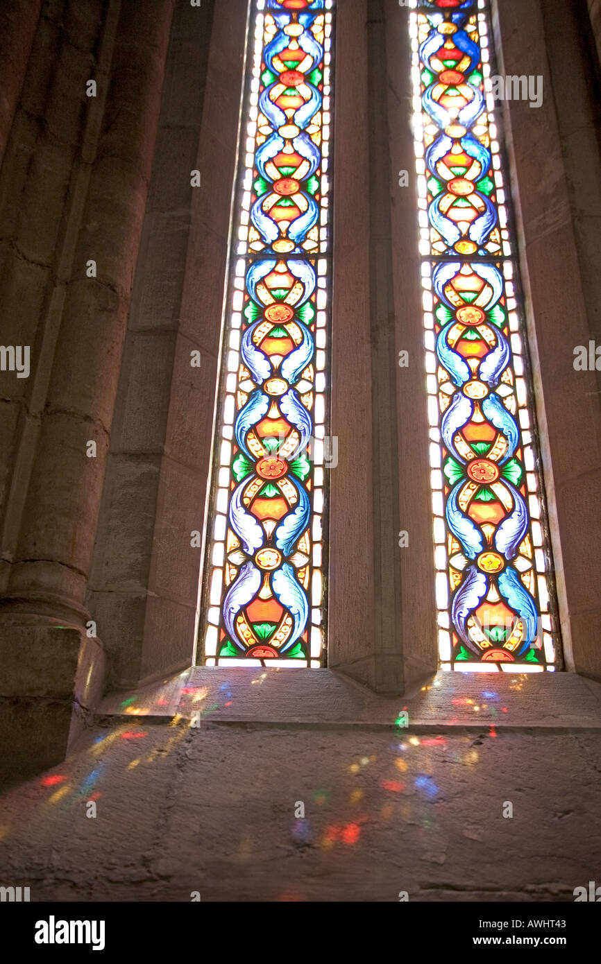 Sun pours through a stained glass window in the cathedral in Lisbon ...