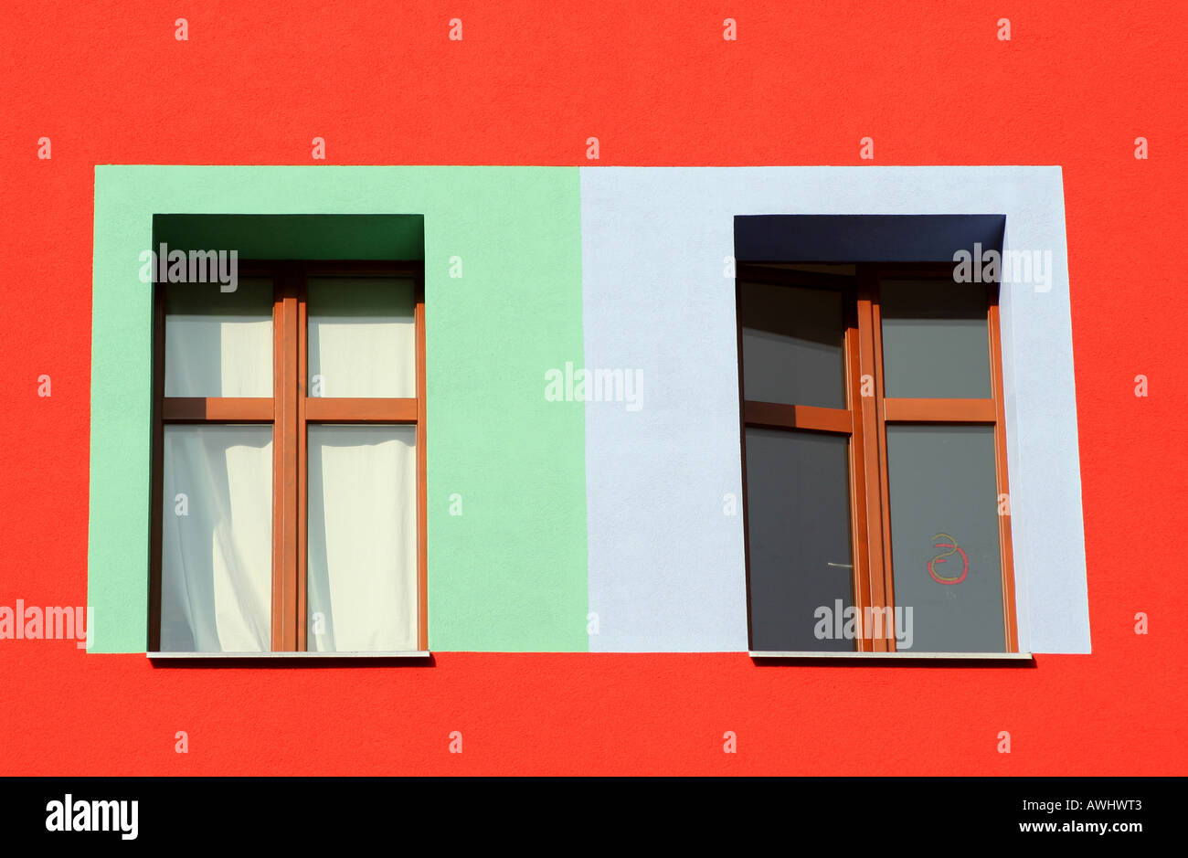 red wall green and blue window frame Stock Photo - Alamy