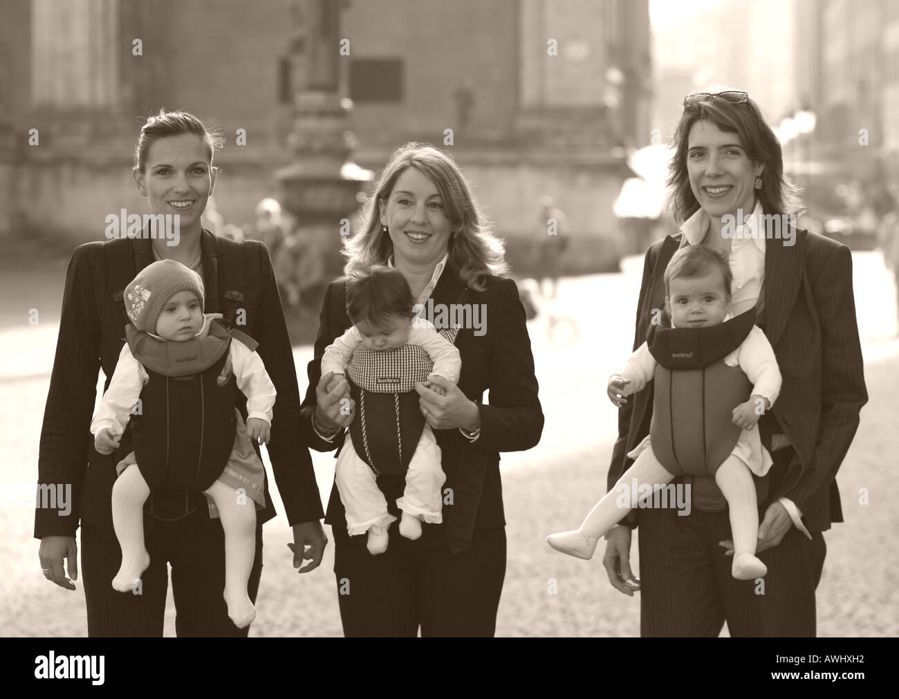 Three business women with their babies going to work manager executive ...