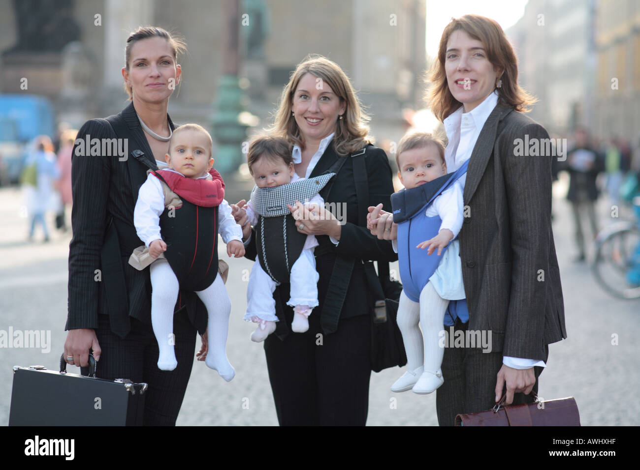Three business women with their babies going to work manager executive ...