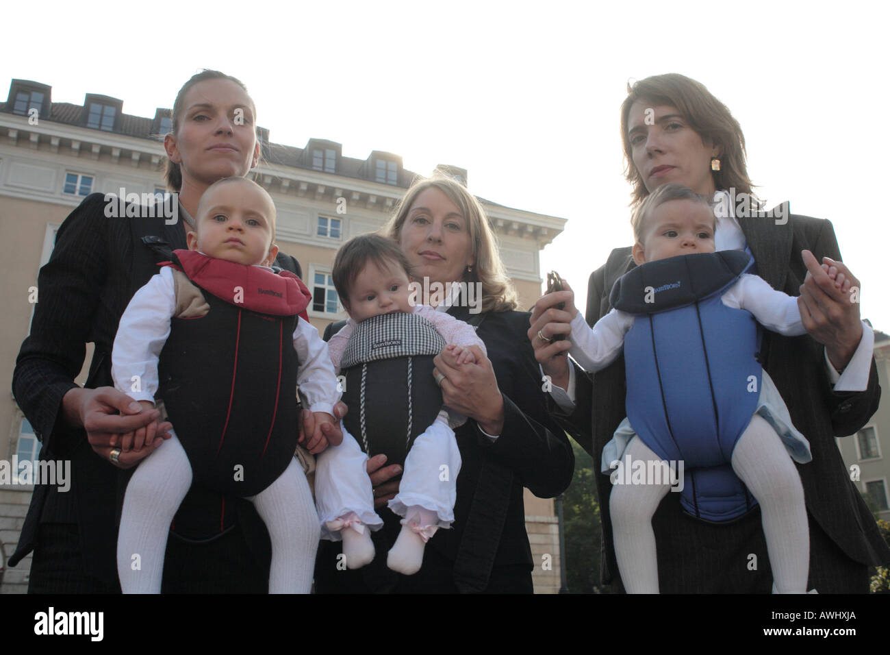 Three business women with their babies going to work manager executive ...