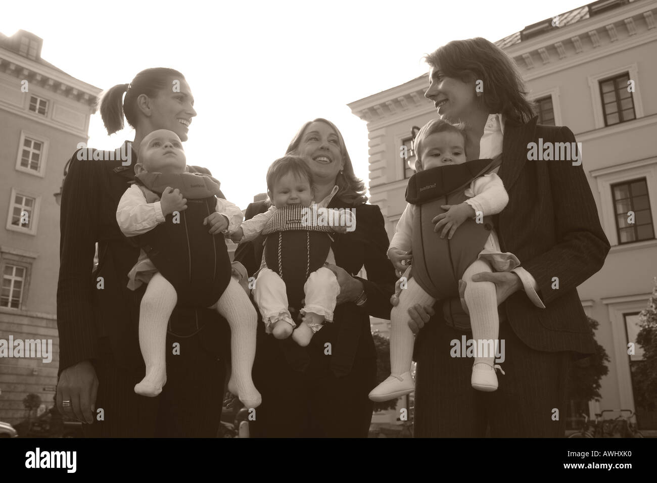 Three business women with their babies going to work manager executive ...