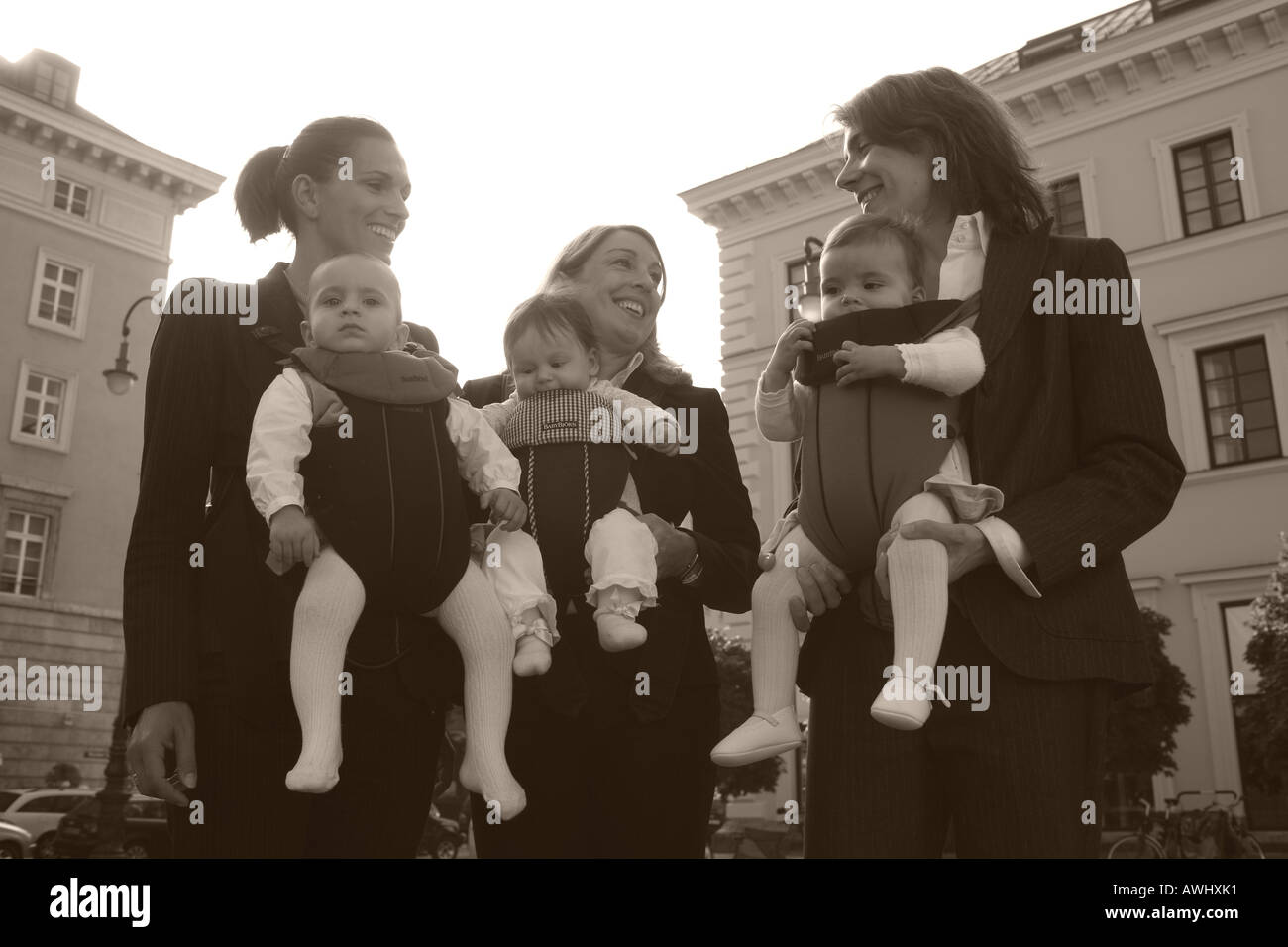 Three business women with their babies going to work manager executive ...