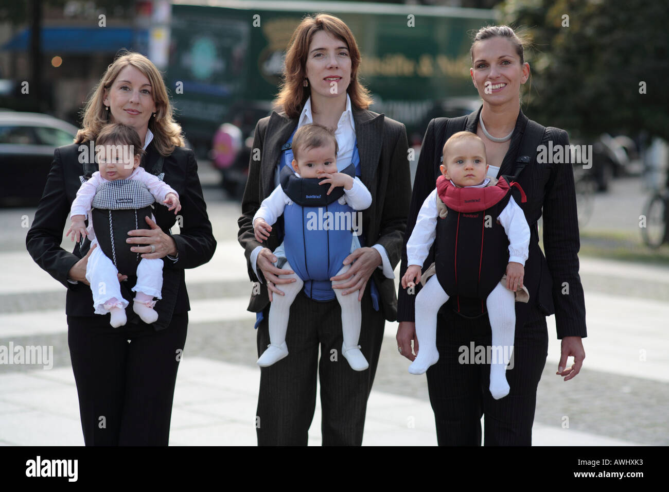 Three business women with their babies going to work manager executive ...