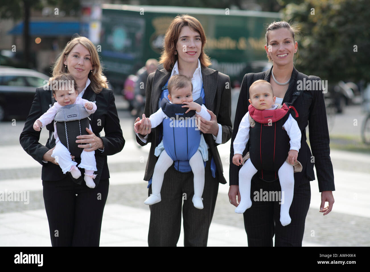 Three business women with their babies going to work manager executive ...