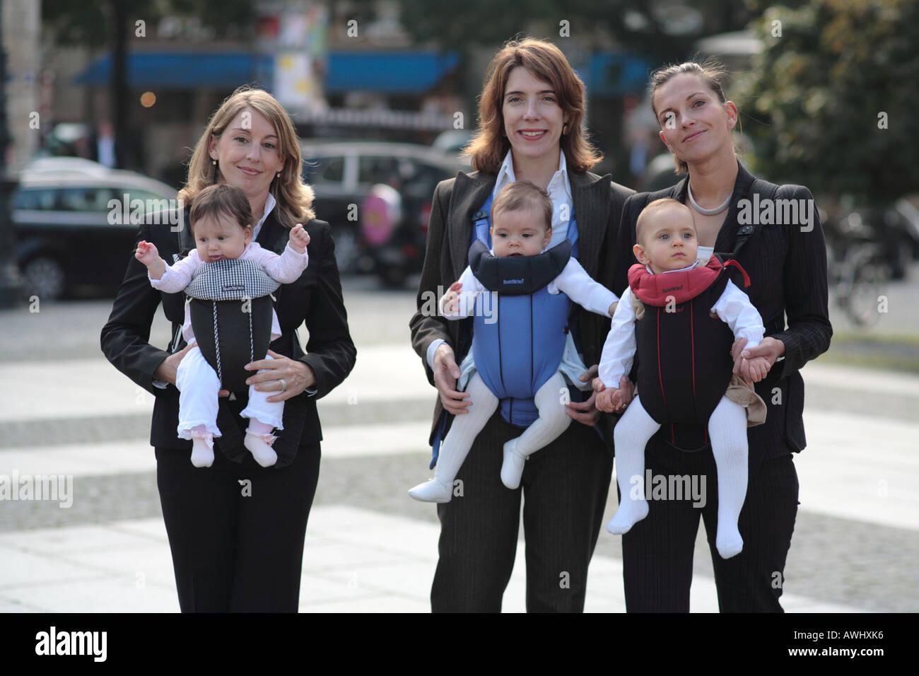 Three business women with their babies going to work manager executive ...