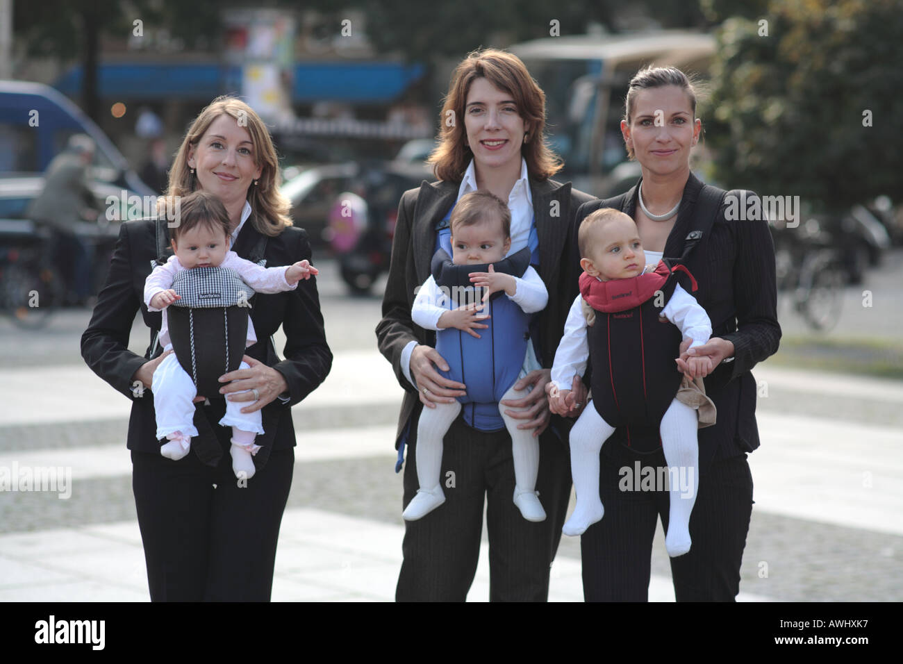 Three business women with their babies going to work manager executive ...