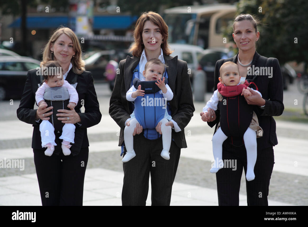 Three business women with their babies going to work manager executive ...