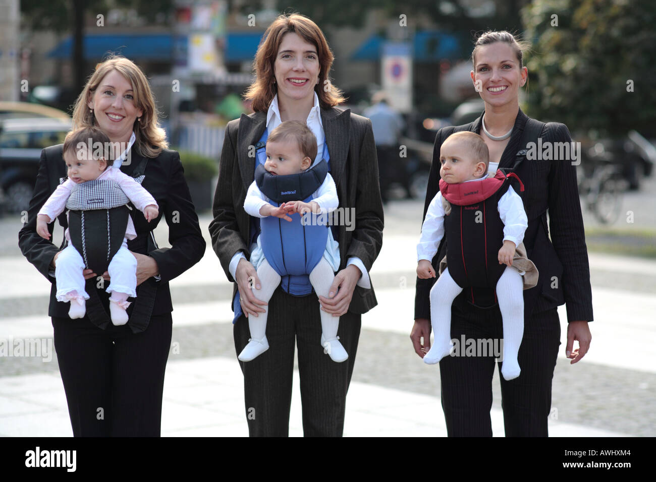 Three business women with their babies going to work manager executive ...