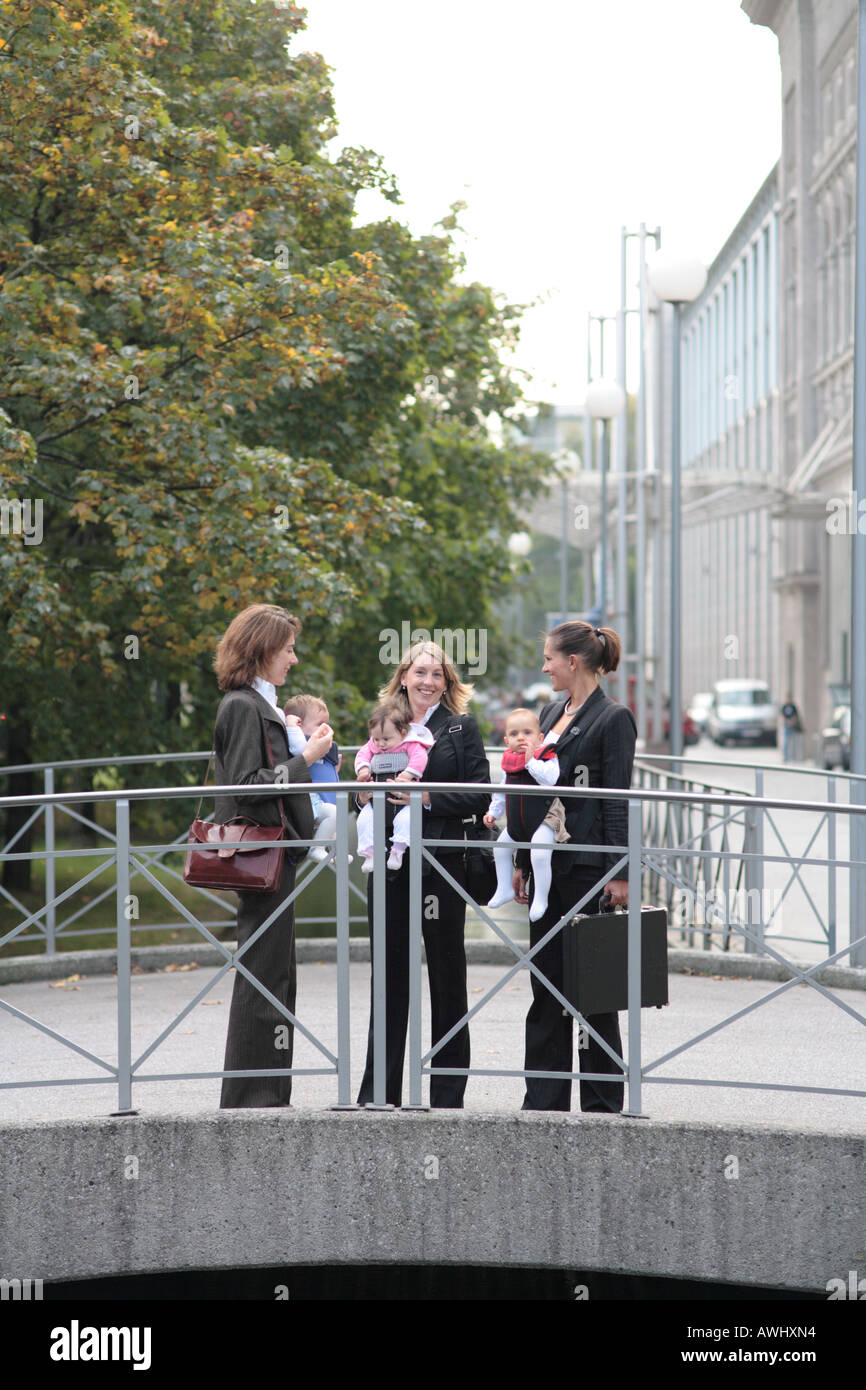 Three business women with their babies going to work manager executive ...