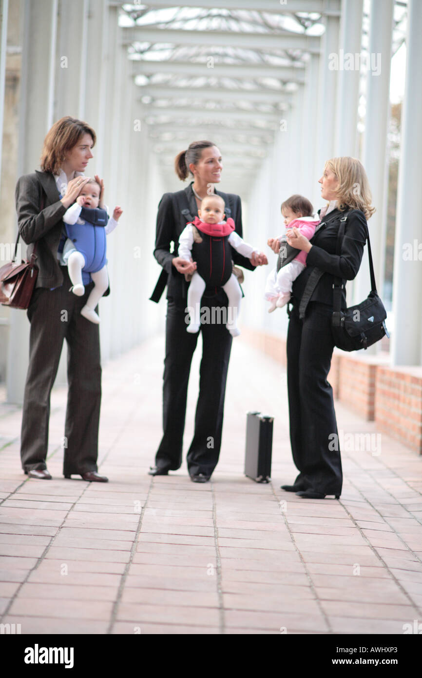 Three business women with their babies going to work manager executive ...