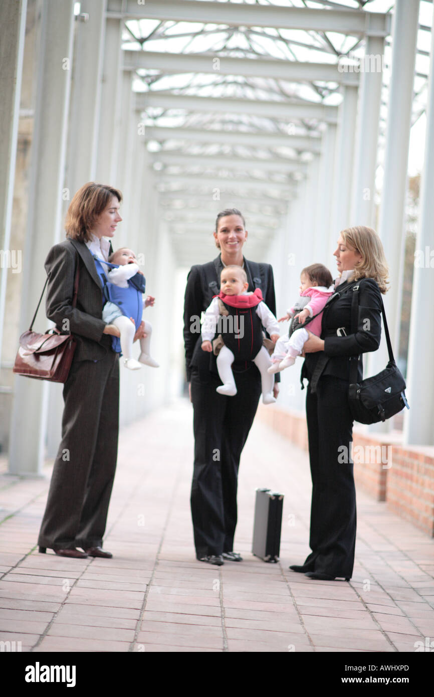 Three business women with their babies going to work manager executive ...