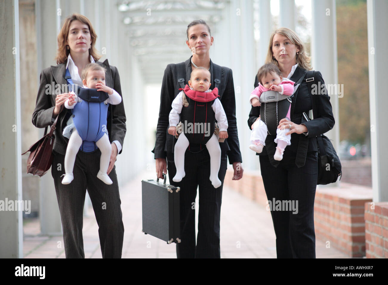 Three business women with their babies going to work manager executive ...