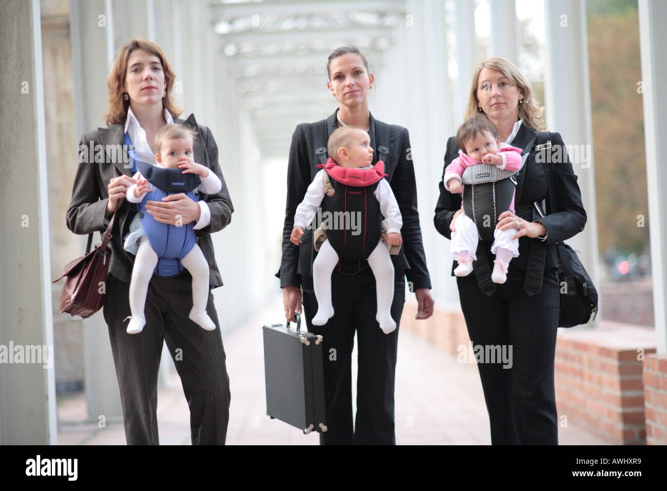 Three business women with their babies going to work manager executive ...