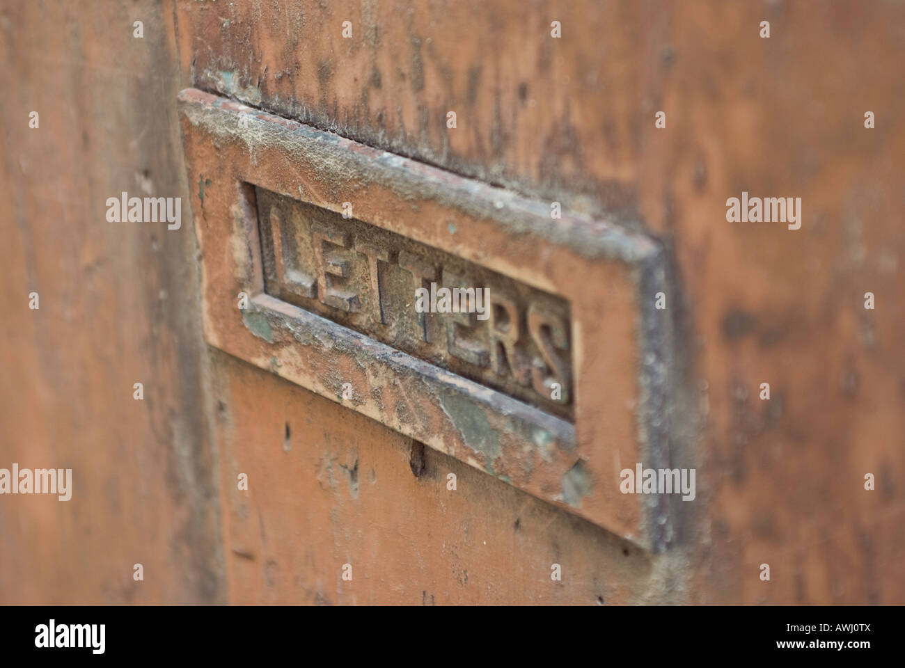 Old rusty letterbox on a distressed door Stock Photo - Alamy