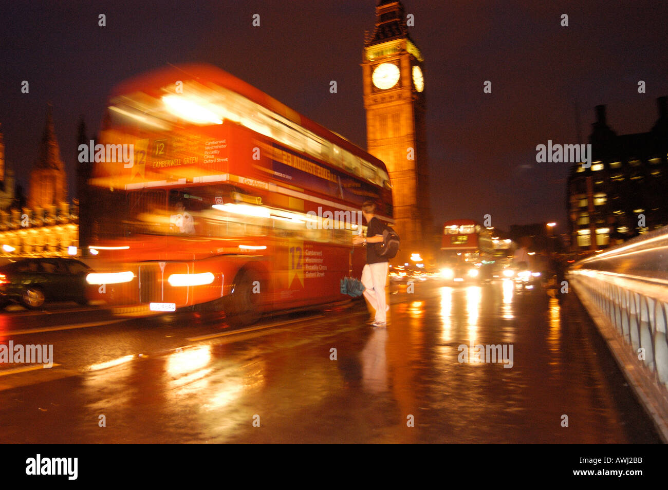 London bus crossing Westminster bridge at night London Stock Photo - Alamy
