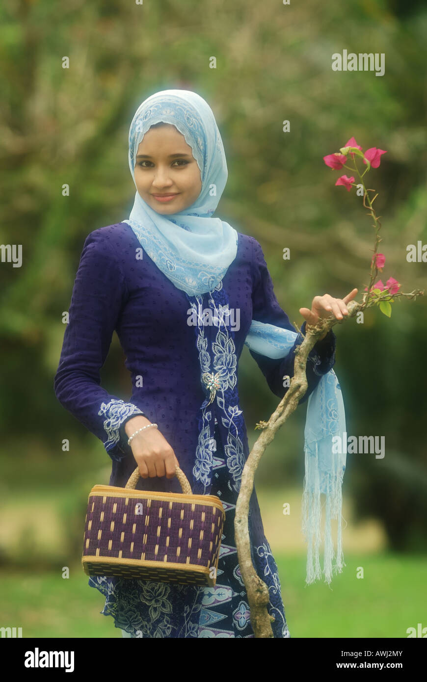 Cute Malaysian Girl with scarf in village Stock Photo - Alamy