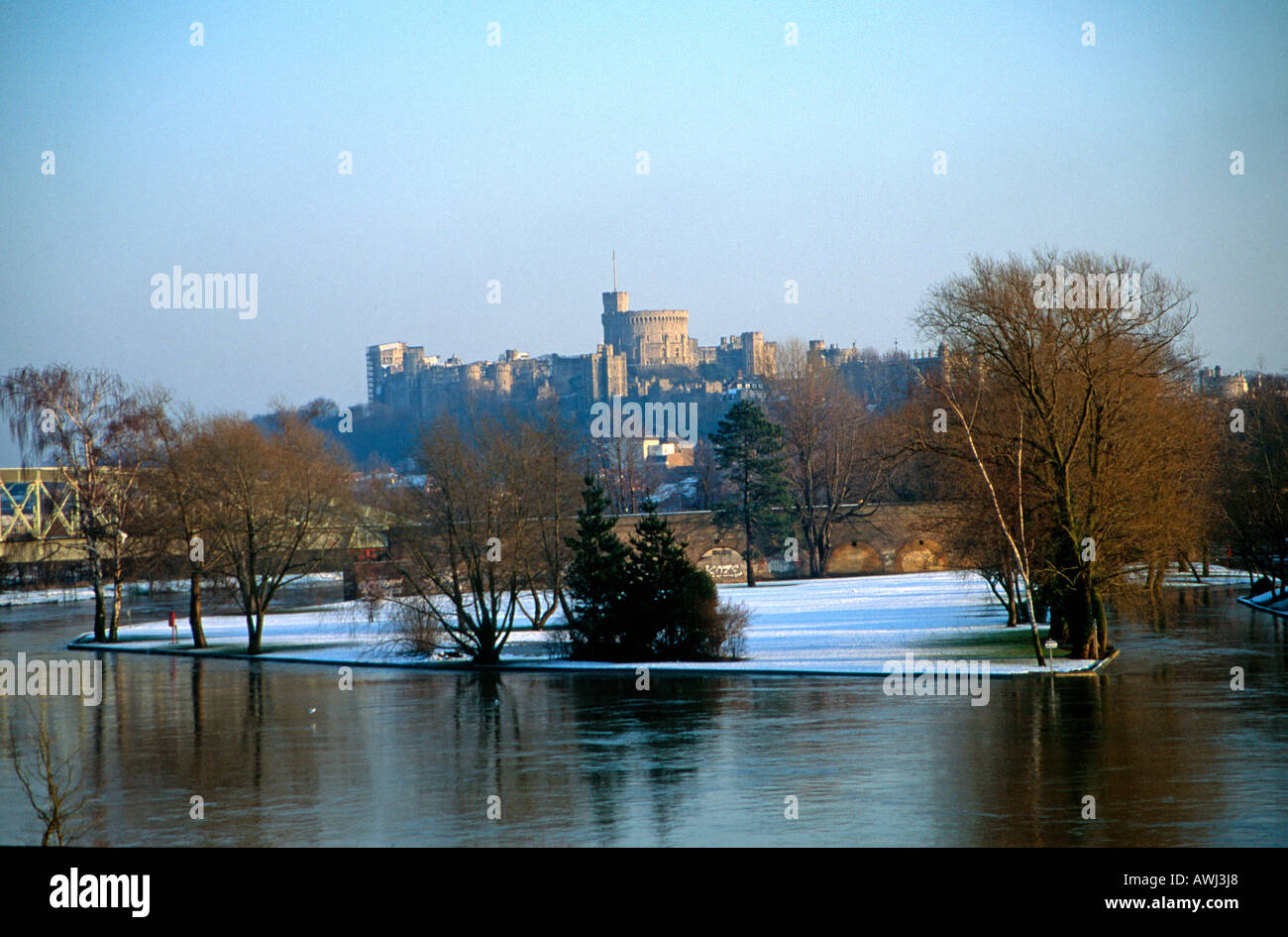 Windsor castle beyond the River Thames with winter snow Berkshire ...