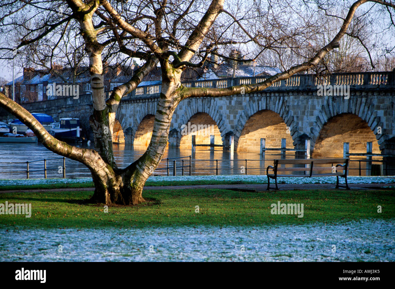 Winter sunlight coming through arches of Maidenhead Bridge over River ...