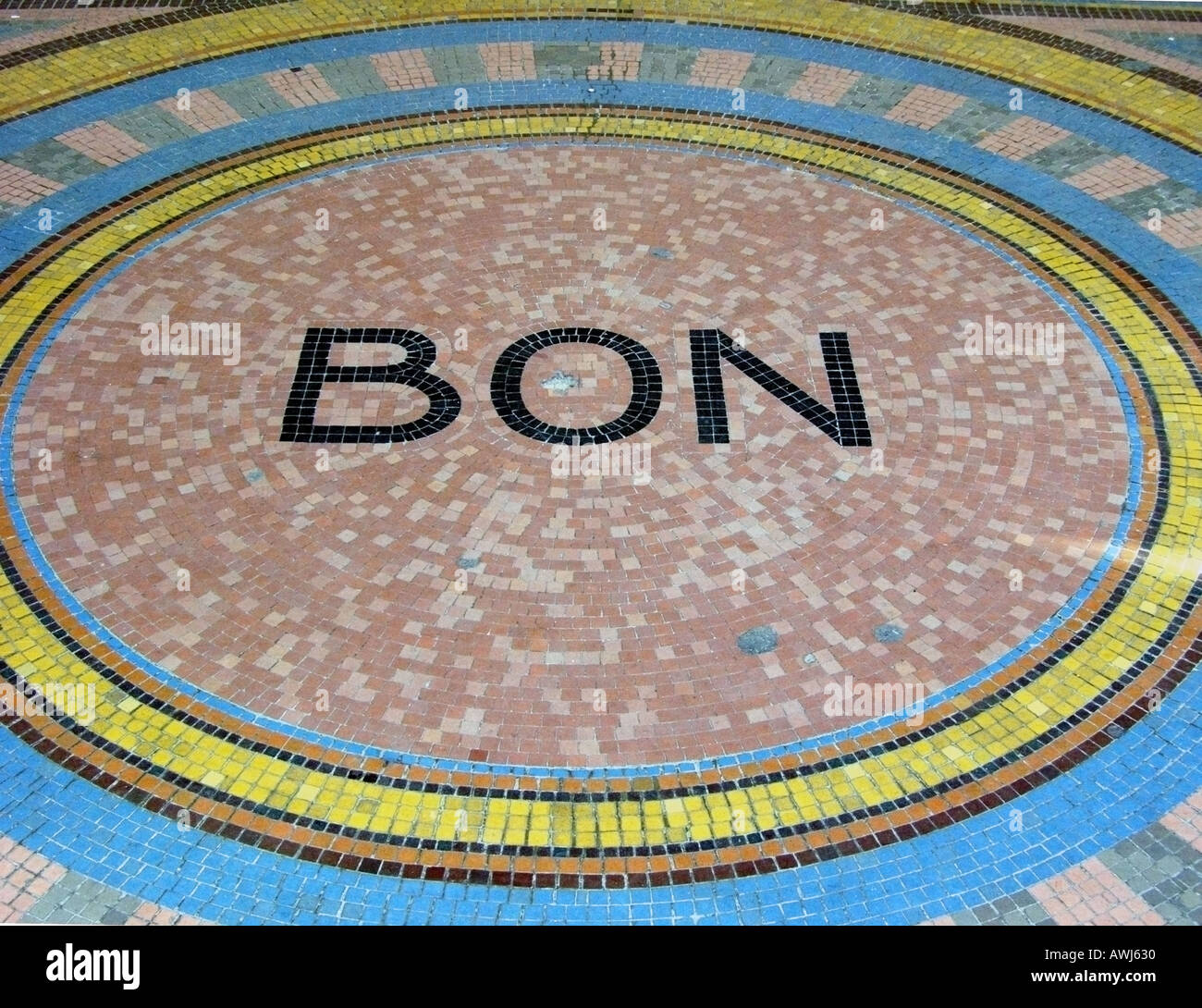Pavement with inlaid mosaic tiles Stock Photo - Alamy