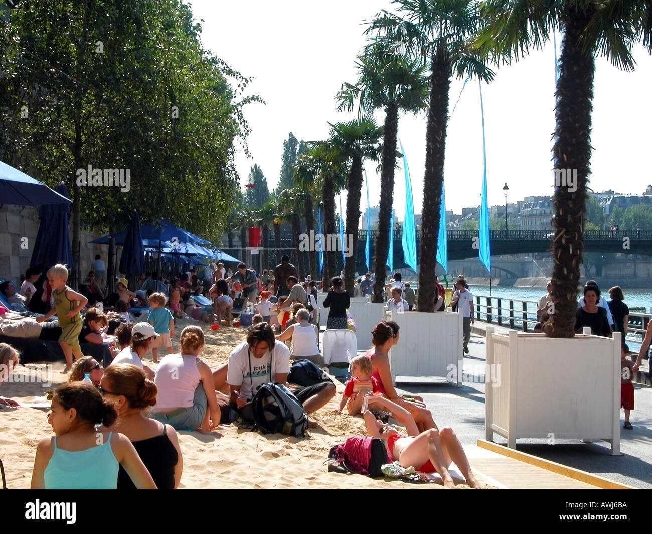 france paris paris-plage people relaxing on artificial beach along the ...