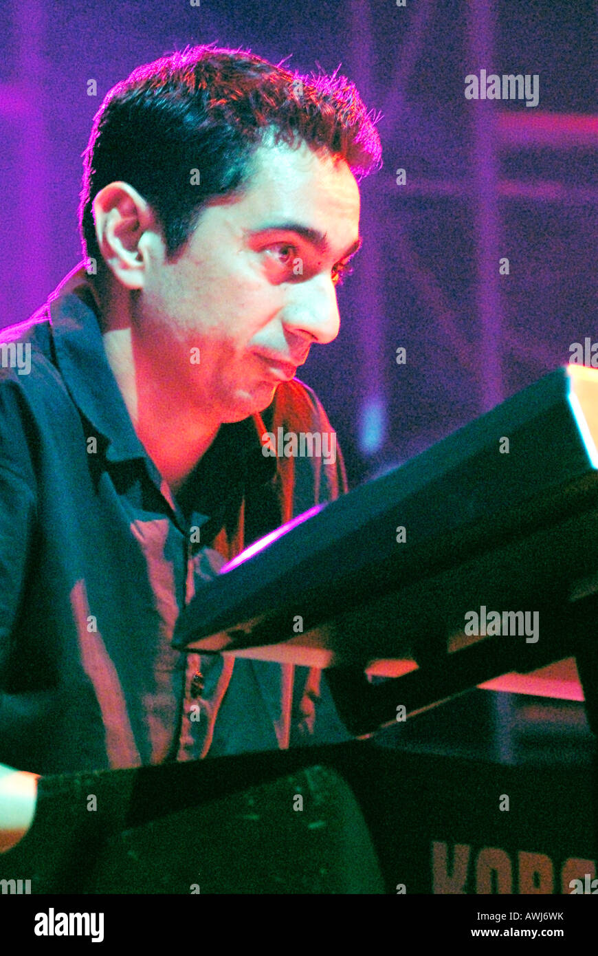 Chris Jerome playing keyboards with Courtney Pine at The Opera House in ...