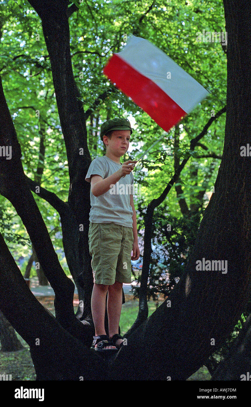 Boy waving the Polish flag during the 60th Anniversary of the Warsaw ...