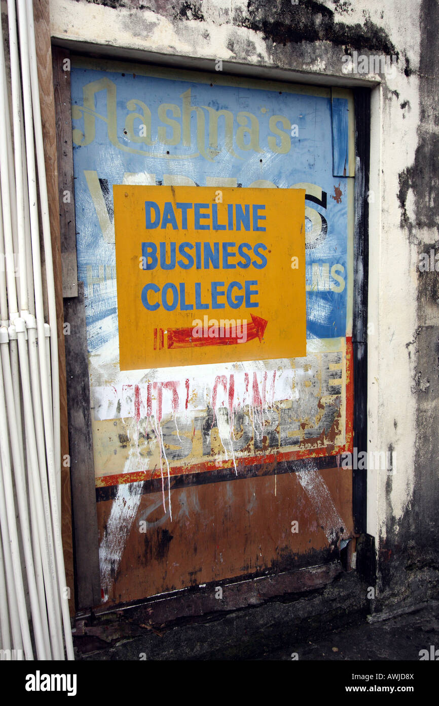 SIGN ON OLD RUN DOWN DOOR ADVERTISING BUSINESS COLLEGE VERTICAL ...