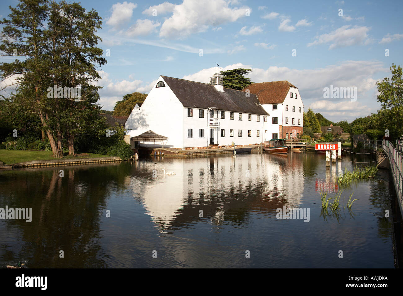 Hambleden Mill with weather vain on wier near Henley on Thames on River ...