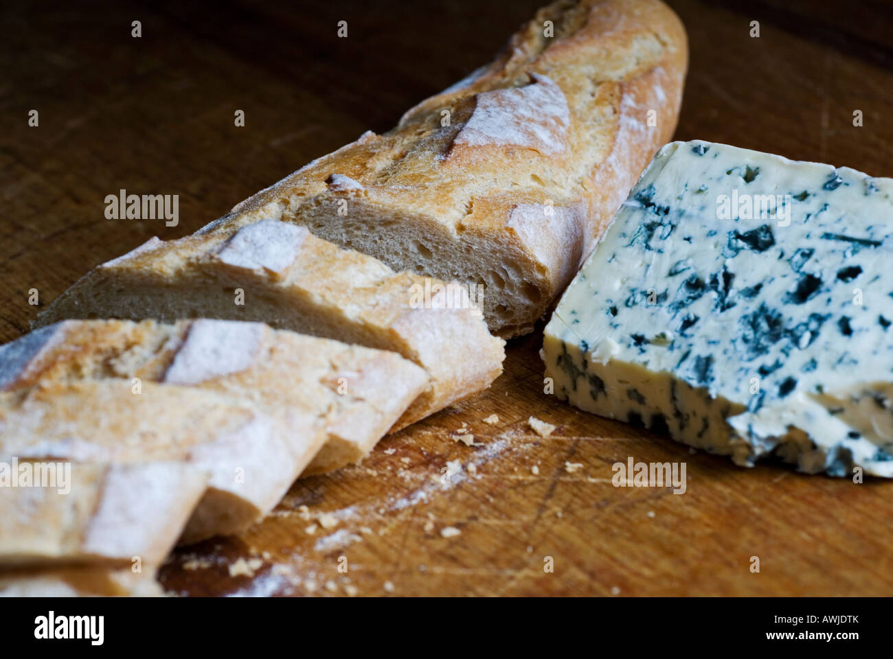Stock photo of sliced French stick with a lump of Auvergne cheese Stock ...