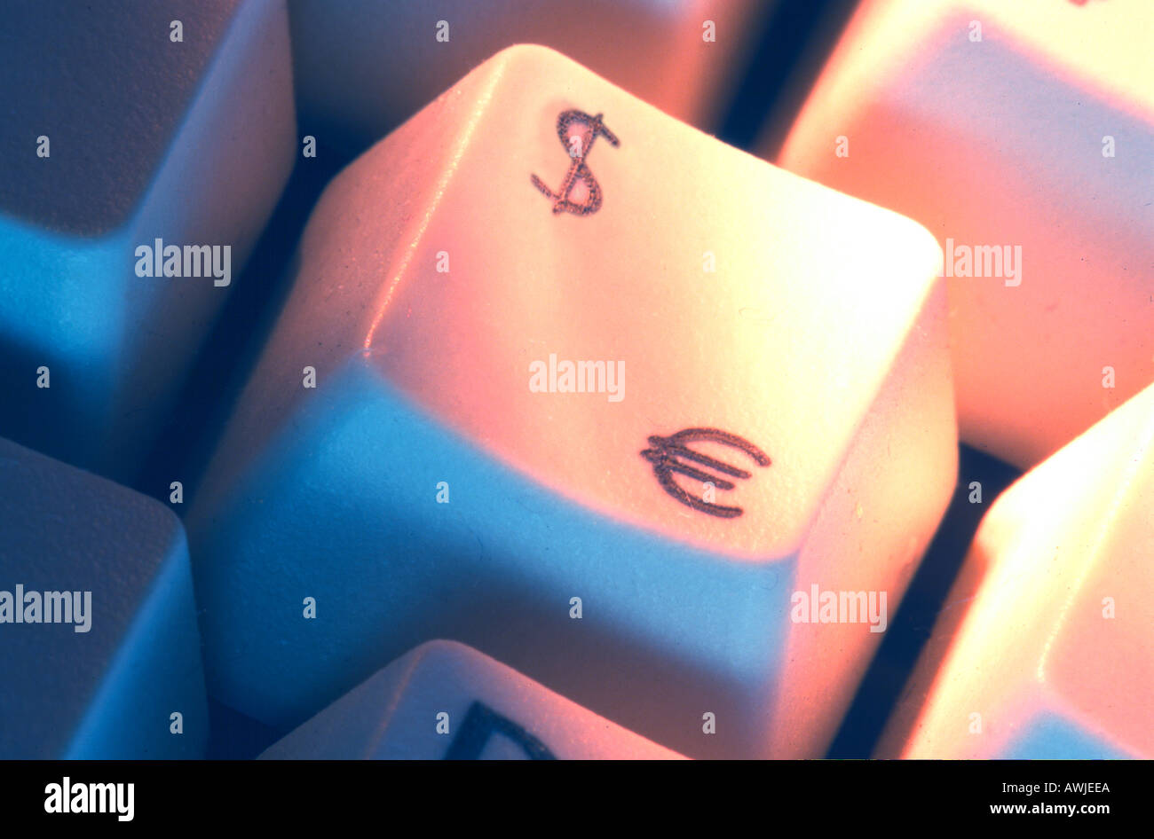 Computer key with dollar sign and pound symbol Stock Photo - Alamy