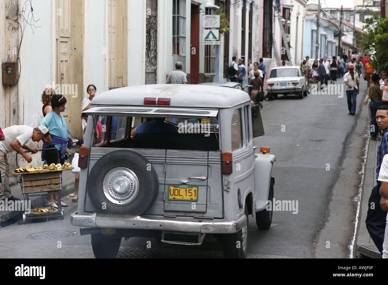 older car driving on street in Cuba Stock Photo - Alamy