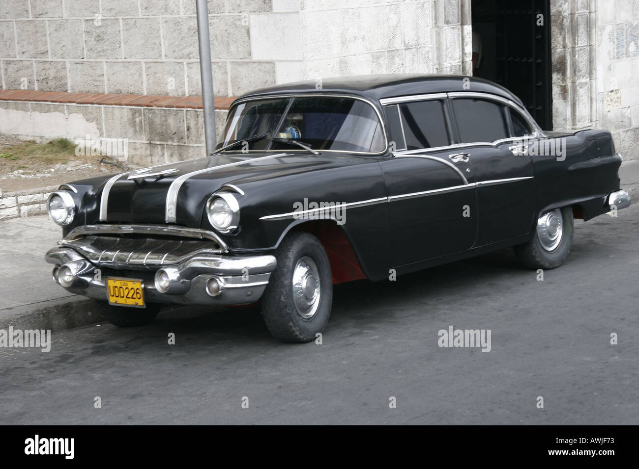 car Cuba street Santiago old antique driving Pontiac taxi red clean ...