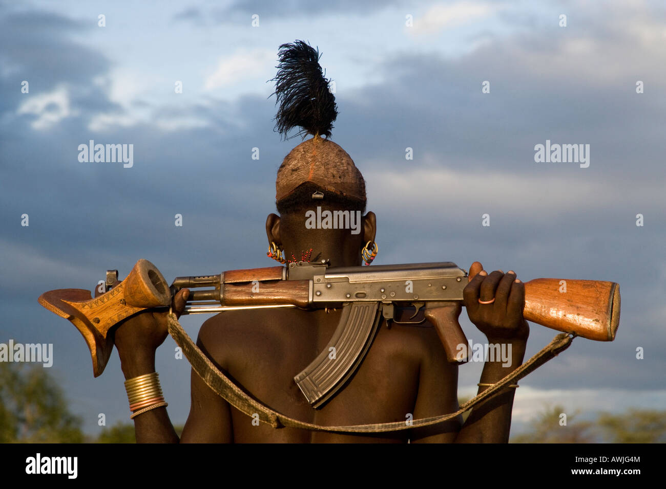 Man of the Hamer Tribe Carries and Automatic Rifle and his Homemade ...