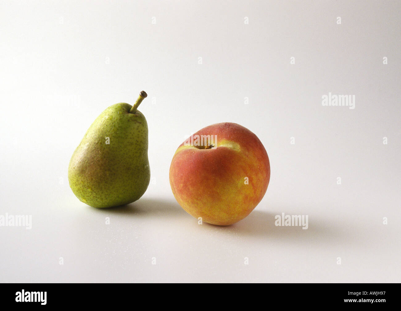 Peach and pear Stock Photo - Alamy