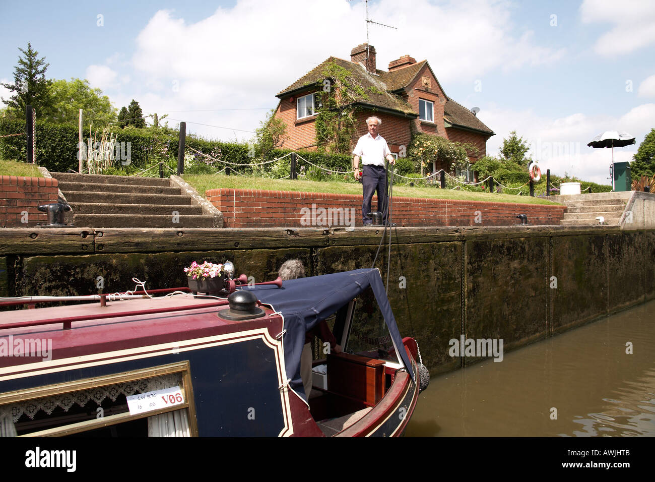 Longboat passing through Mapledurham Lock near Purley on Thames on ...
