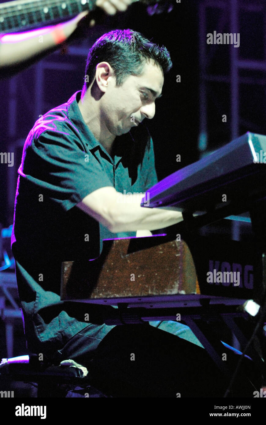 Chris Jerome playing keyboards with Courtney Pine at The Opera House in ...