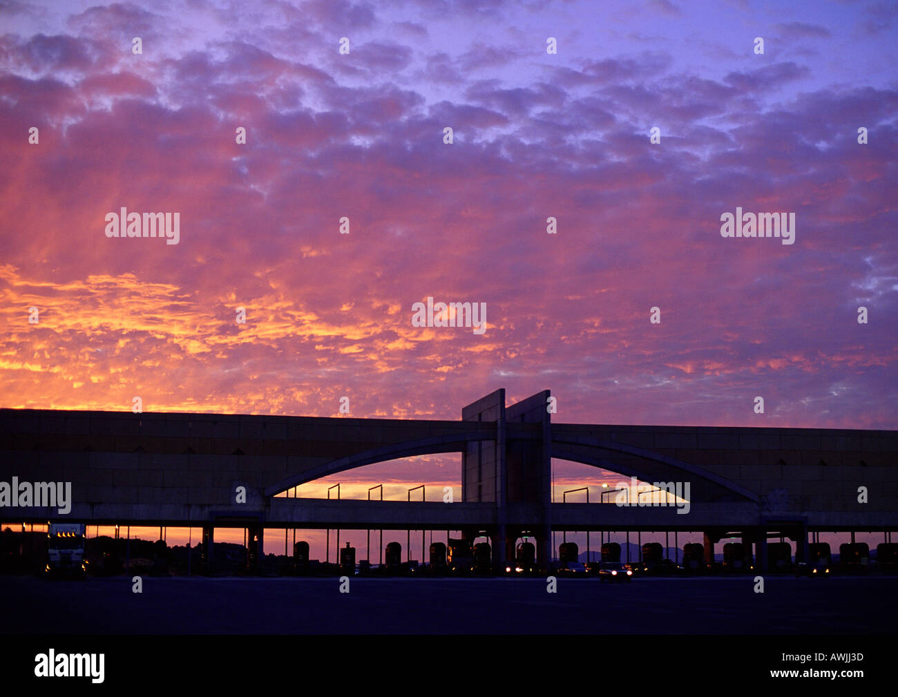 Toll bridge at sunset Stock Photo - Alamy