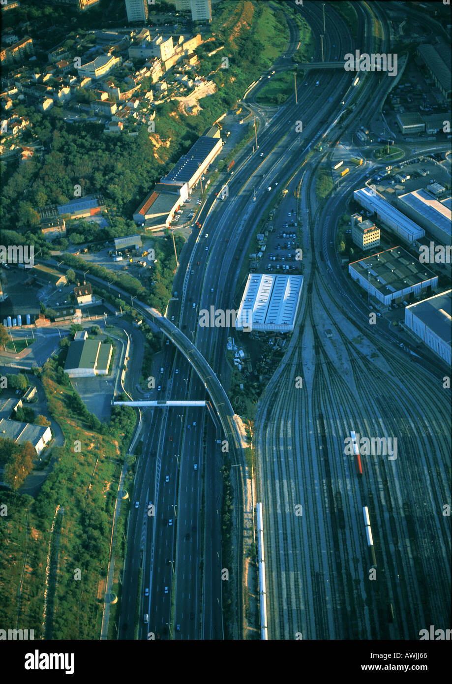 Freeway and trainyard, aerial view Stock Photo - Alamy
