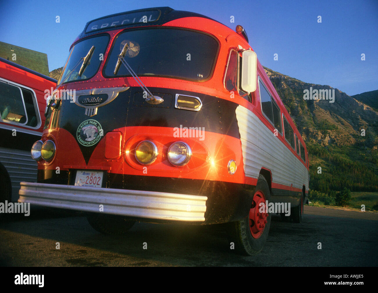 Tour buses, Glacier National Park, Montana, United States Stock Photo ...