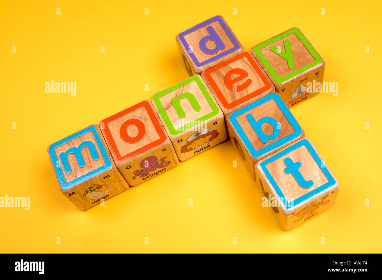 Wooden blocks depicting money linked to debt Stock Photo - Alamy