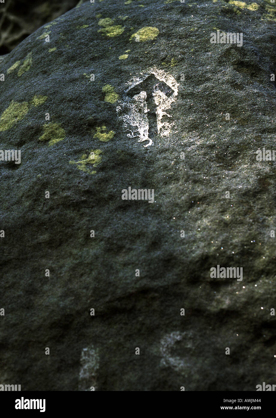 Stenciled arrow on stone Stock Photo - Alamy