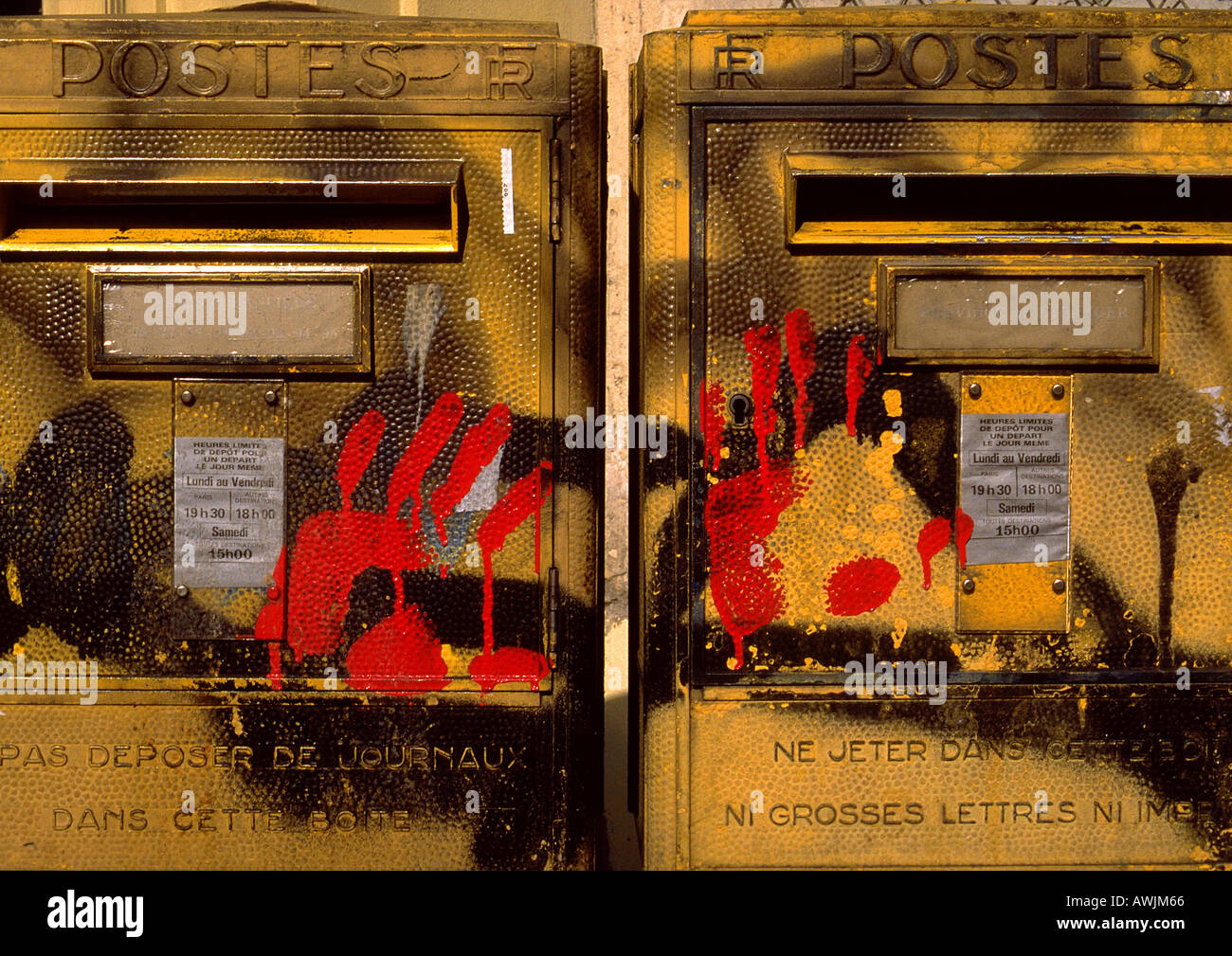 Red hand prints on post office boxes Stock Photo - Alamy