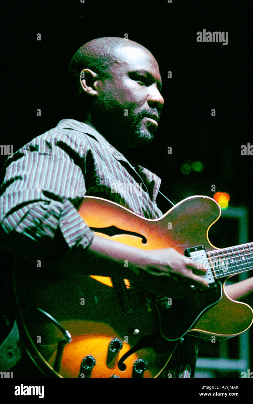 Cameron Pierre on guitar with Courtney Pine at The Opera House in ...