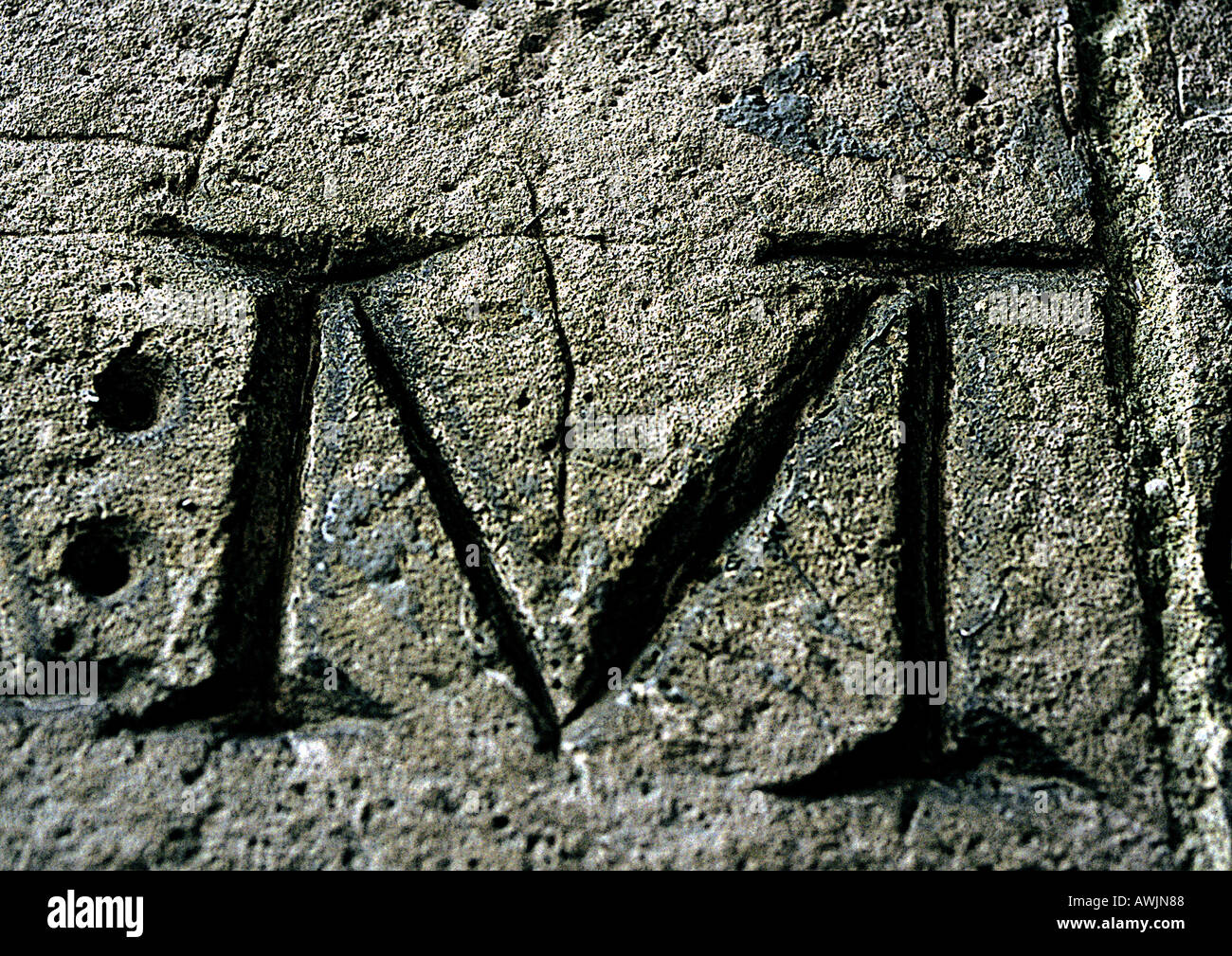 M, text, carved Stock Photo - Alamy